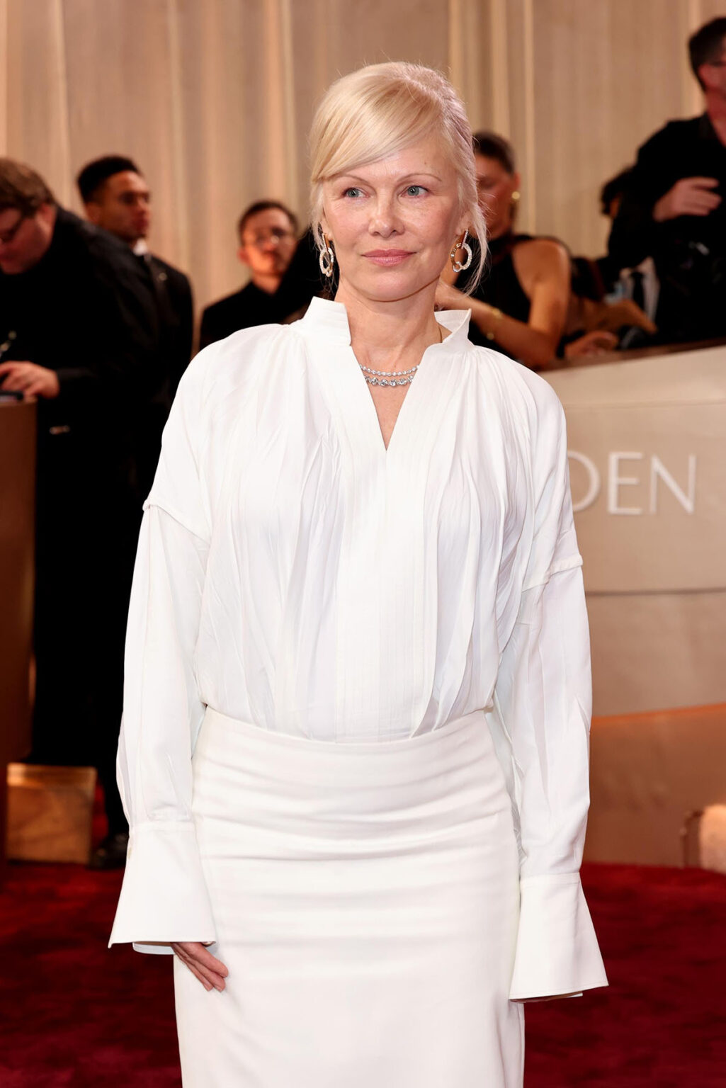 Pamela Anderson's Pared Back Glam in Ferragamo at the Globes - Red ...